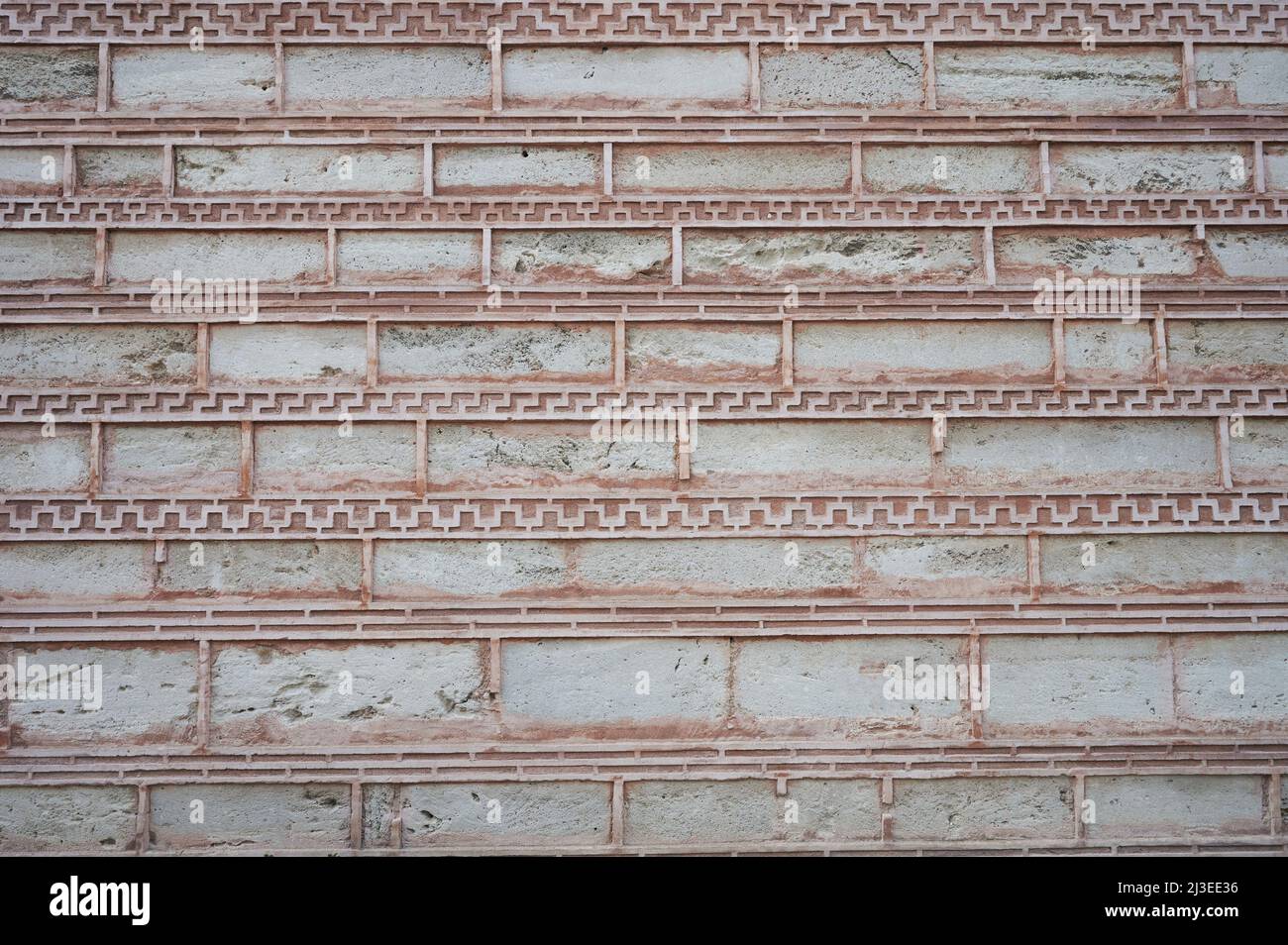 Stone wall with muslim decoration texture background Stock Photo - Alamy