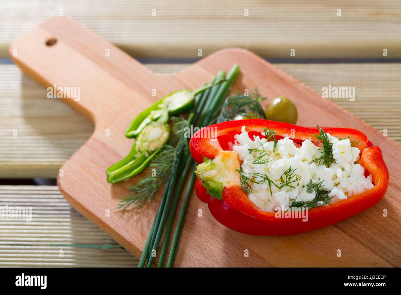 Photography of plate with pepper stuffed with brynza Stock Photo - Alamy