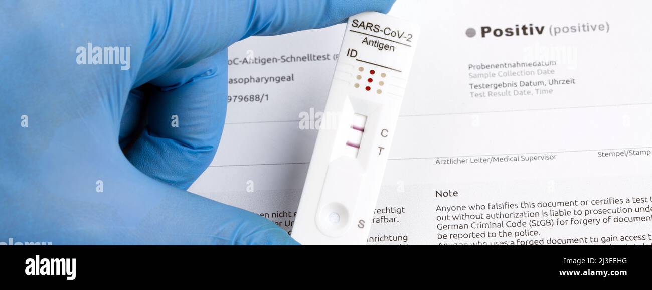 Express corona test. Positive covid antigen test Stock Photo - Alamy