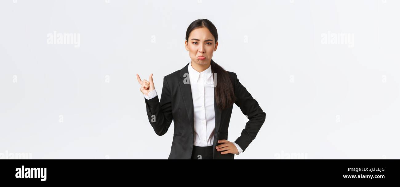 Angry disappointed saleswoman in black suit complaining on small ...