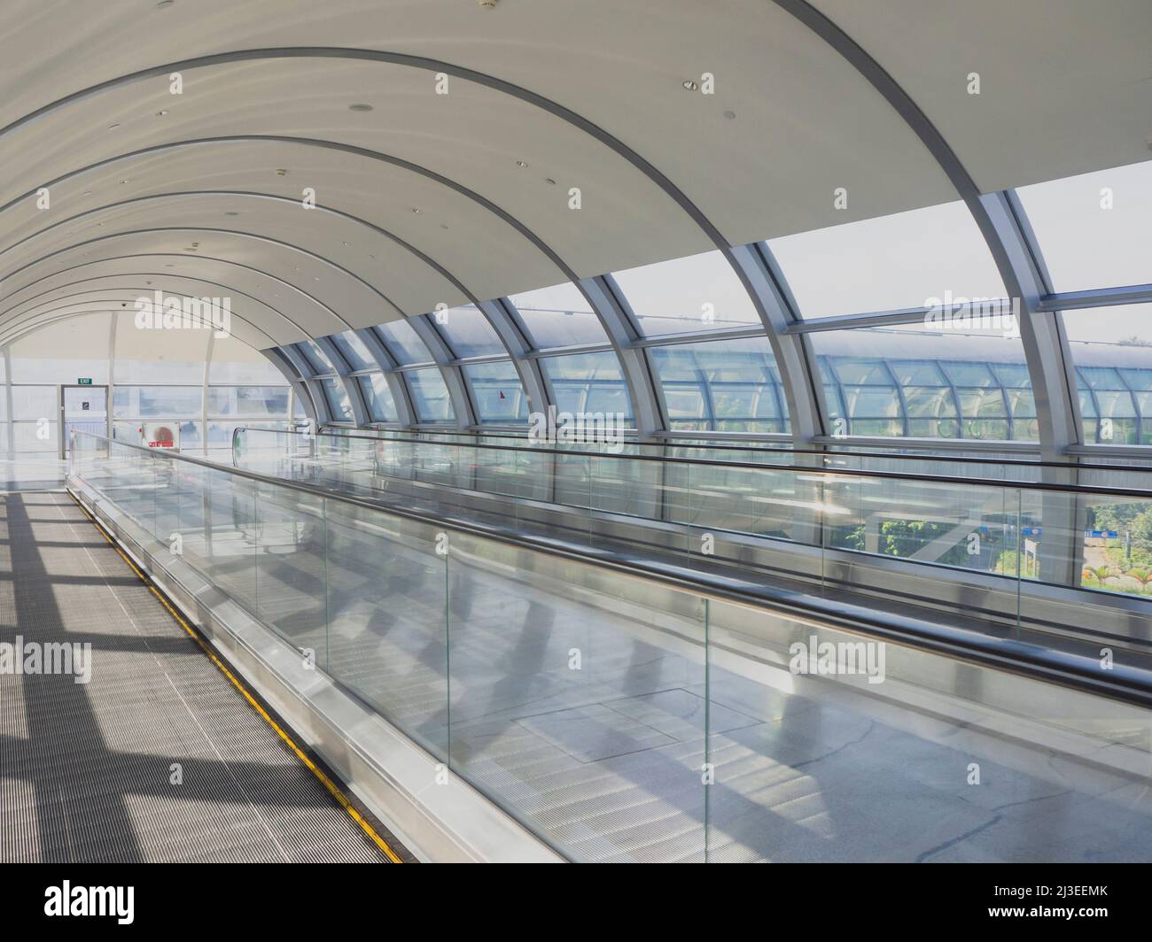 Clean white modern futuristic moving walkway Stock Photo - Alamy