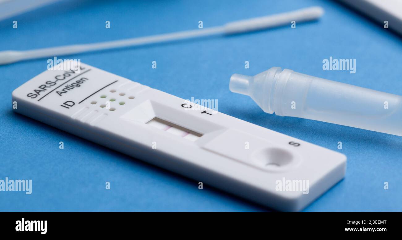 Express corona test. Positive covid antigen test Stock Photo - Alamy