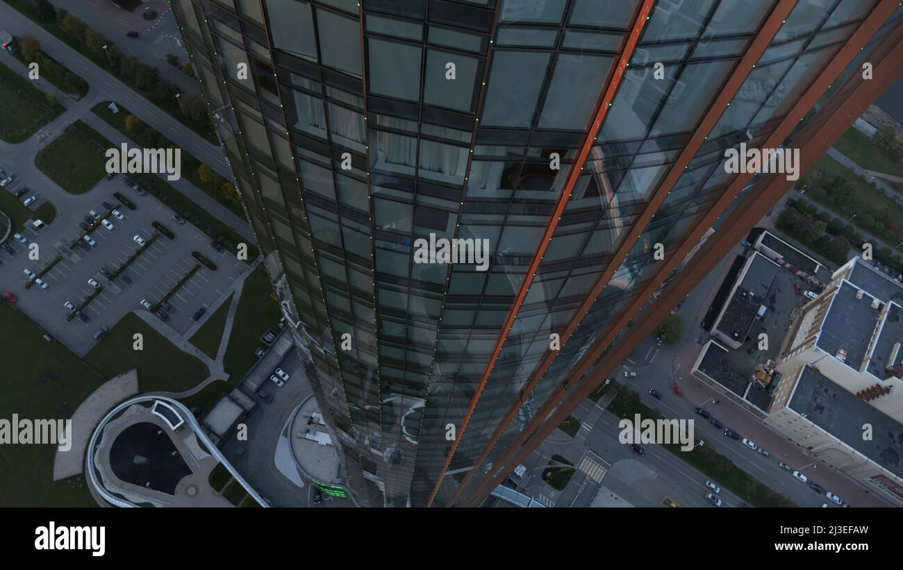 Aerial top view of a skyscraper with glass facade building. Stock ...
