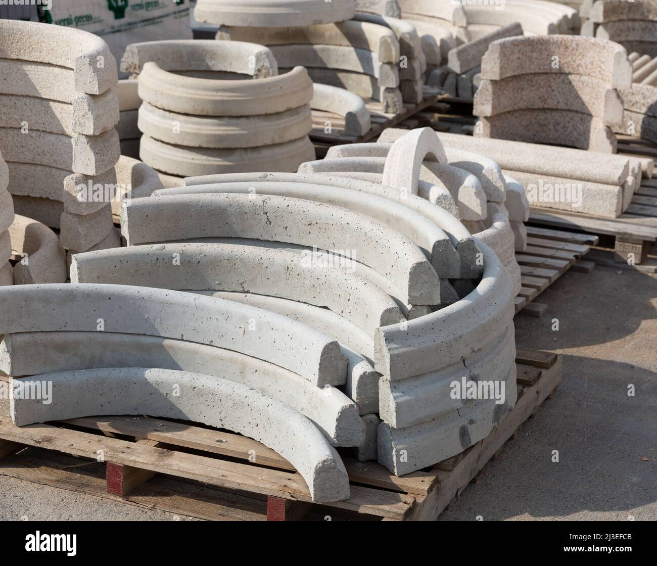 Semicircular rings made of concrete on pallets of hardware store Stock ...