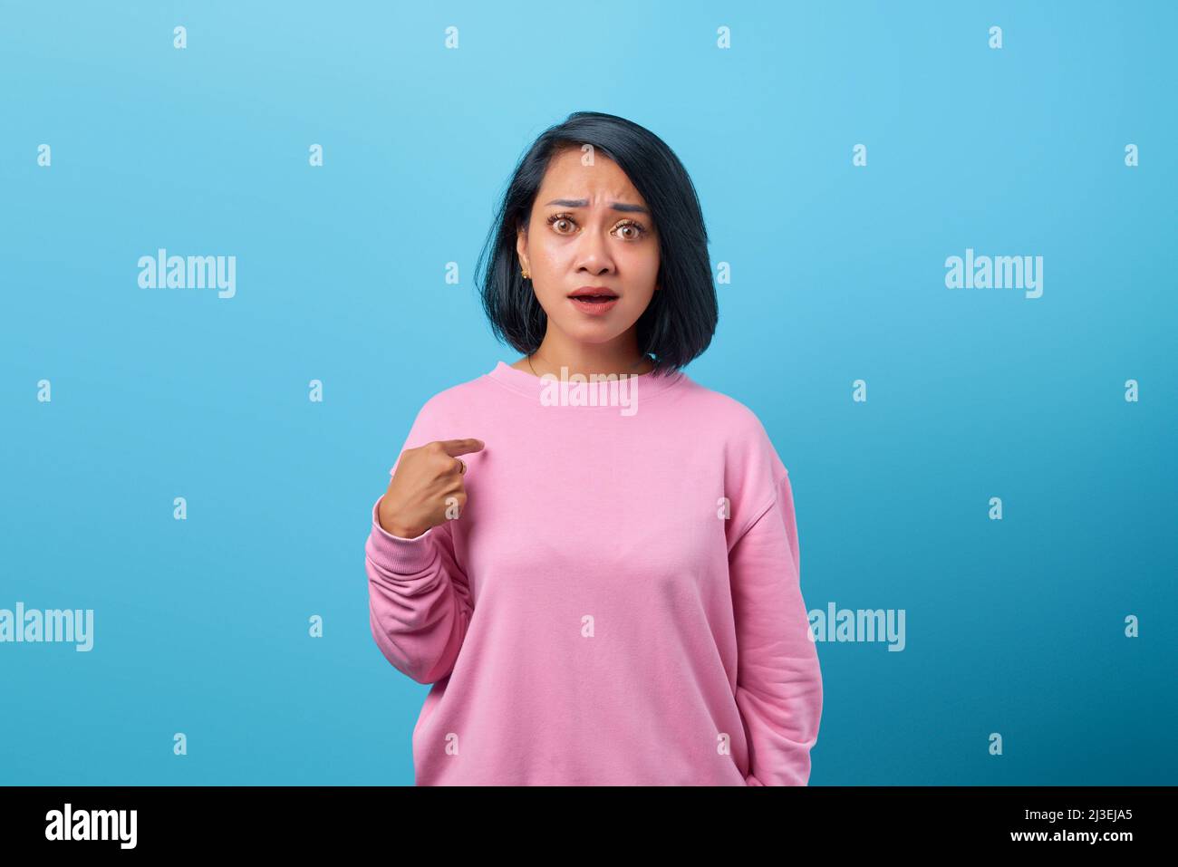 Shocked Asian Woman Portrait asking question and pointing at herself on ...