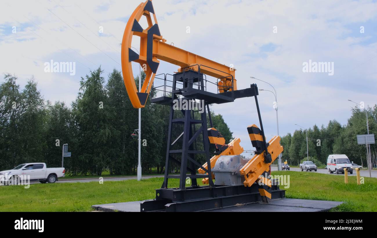 Oil and gas production equipment running on a summer day. The concept ...