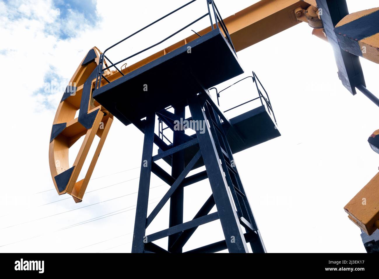 Oil and gas production equipment running on a summer day. The concept ...