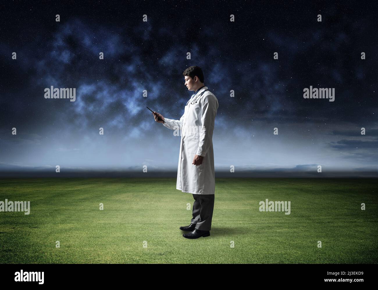 Doctor with tablet Stock Photo - Alamy