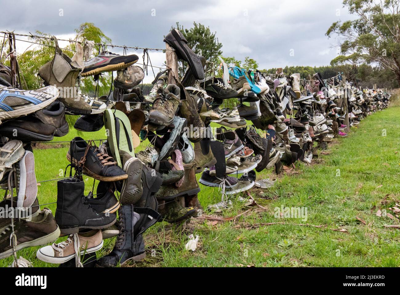 Shoes on fence hi-res stock photography and images - Alamy