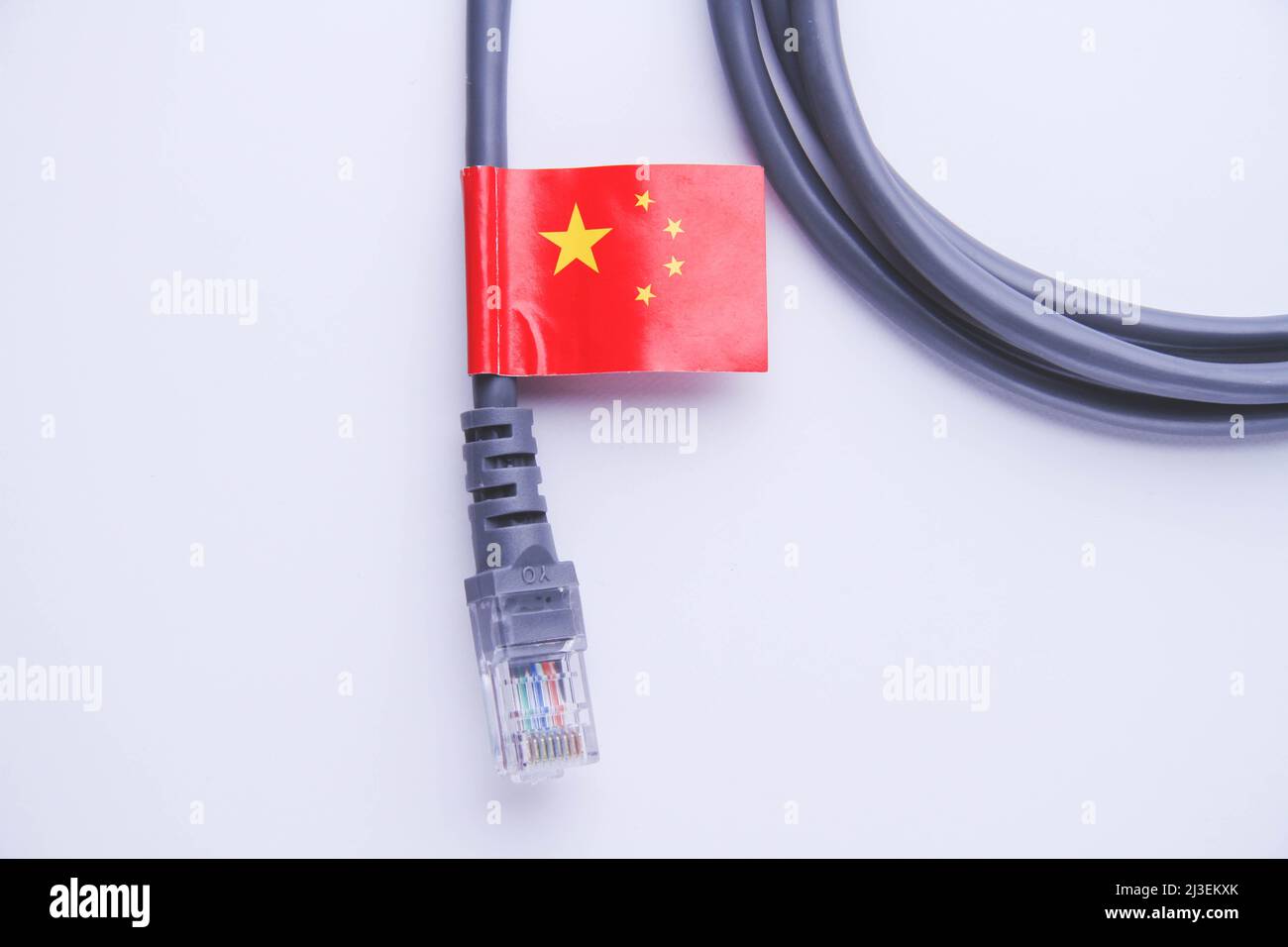 Internet cable with China flag. Connecting a PC to the Internet in ...