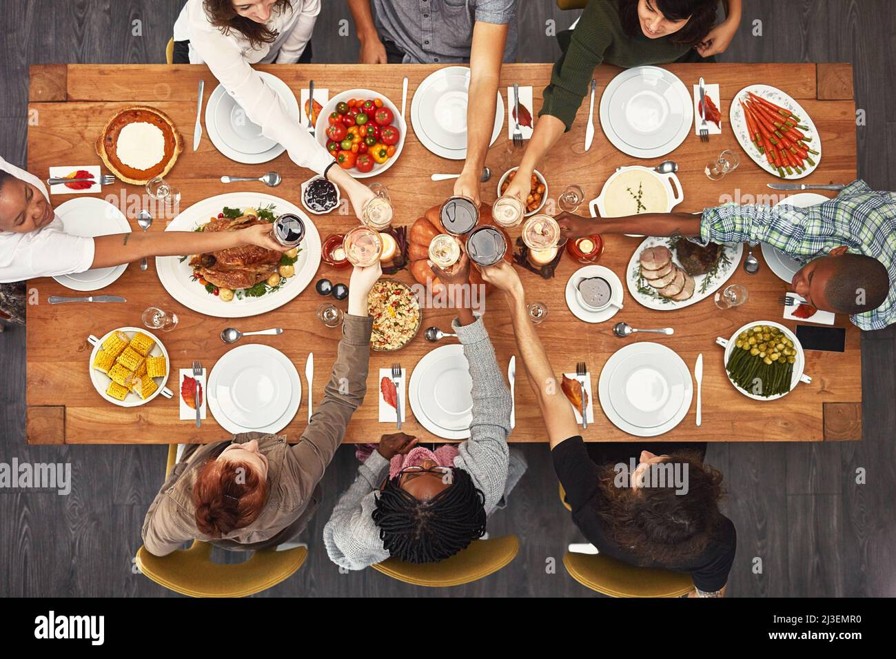 Good food is even better with good friends. Shot of a group of people ...