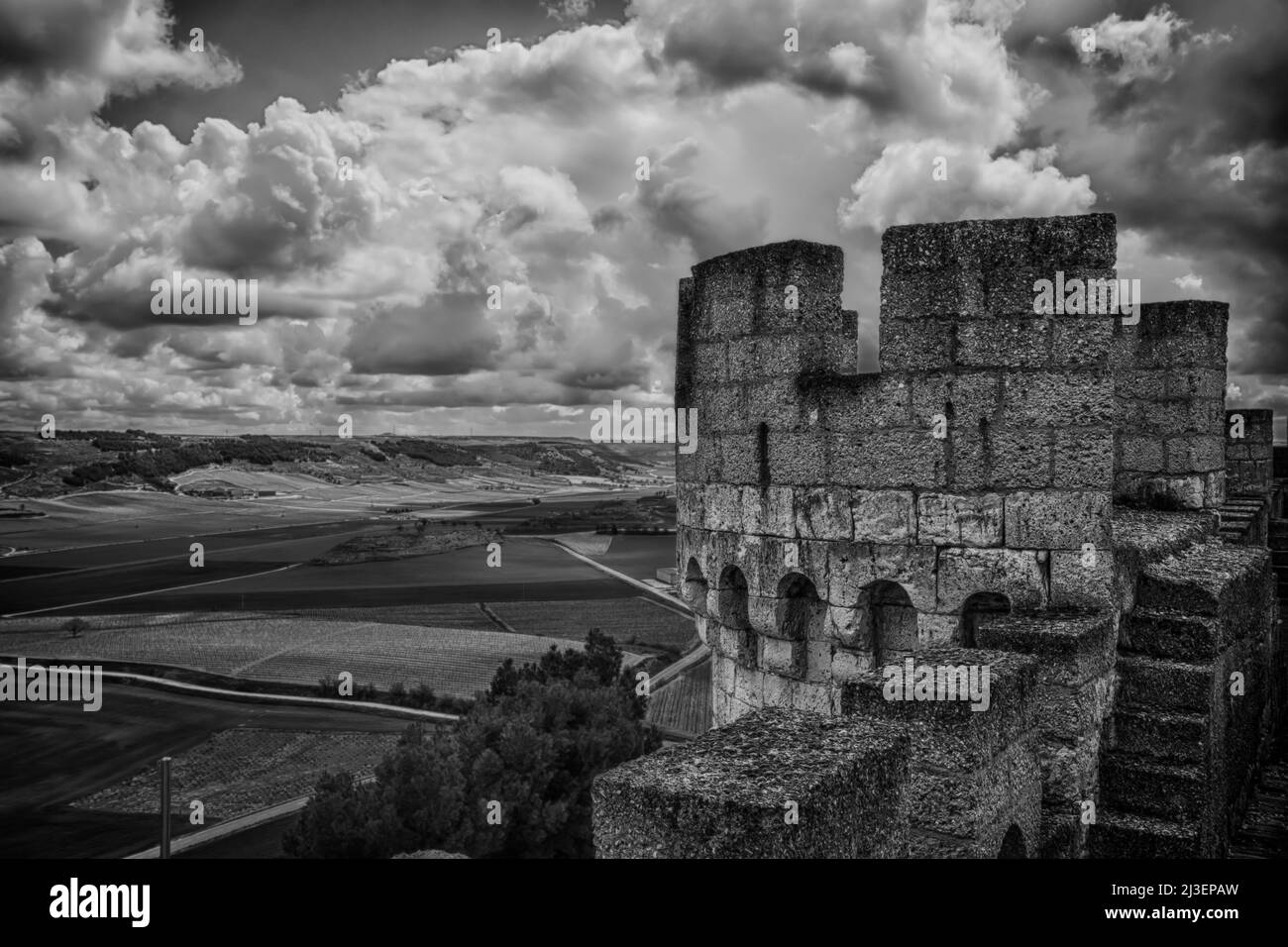 View of medieval wall in front of the field and the sky Stock Photo - Alamy