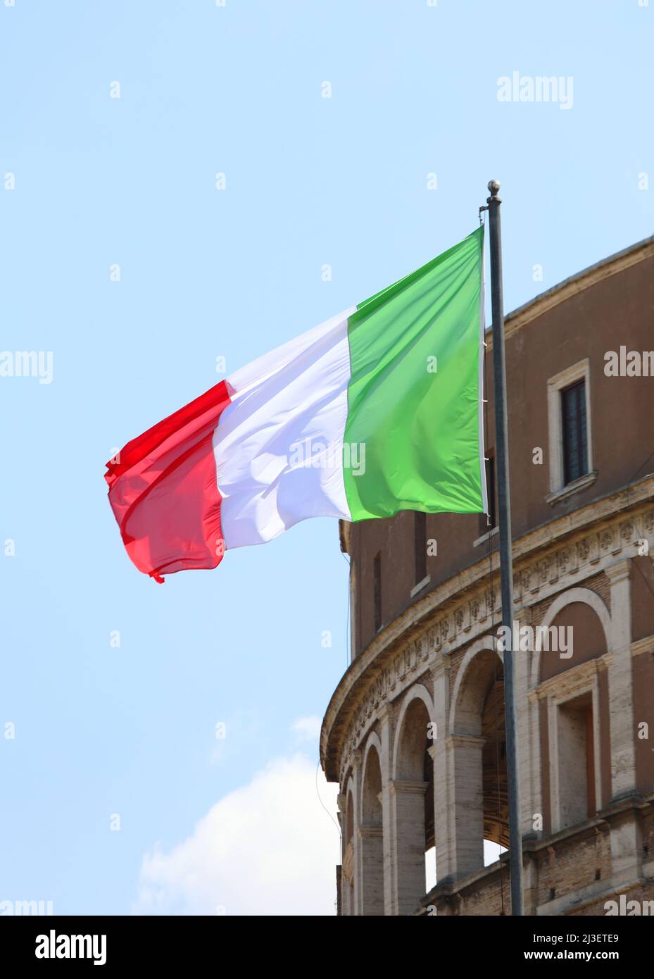 big italian Flag with colors Red white and Green and palace on ...