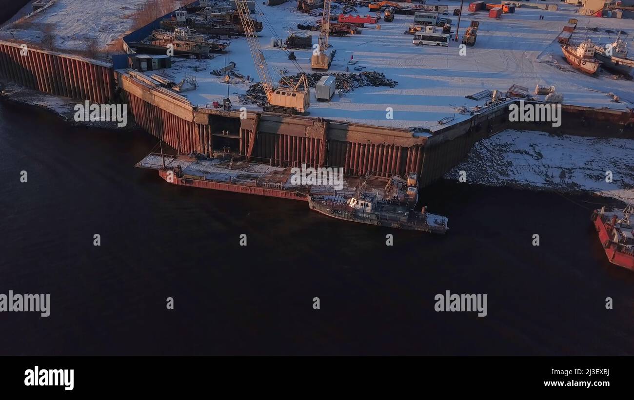 Top view of loading of sea vessels in winter. Clip. Place where large ...