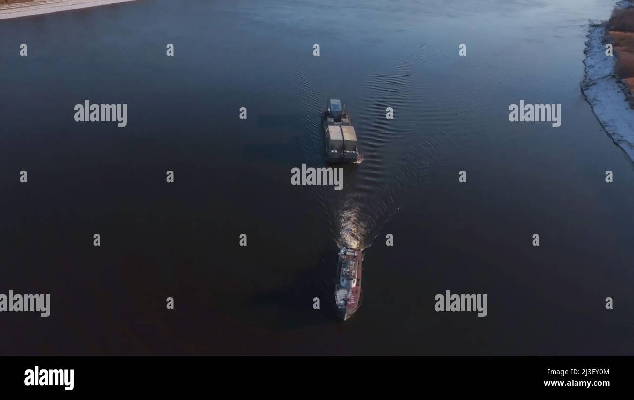 Top view of boat with cargo floating on river. Clip. Beautiful ...