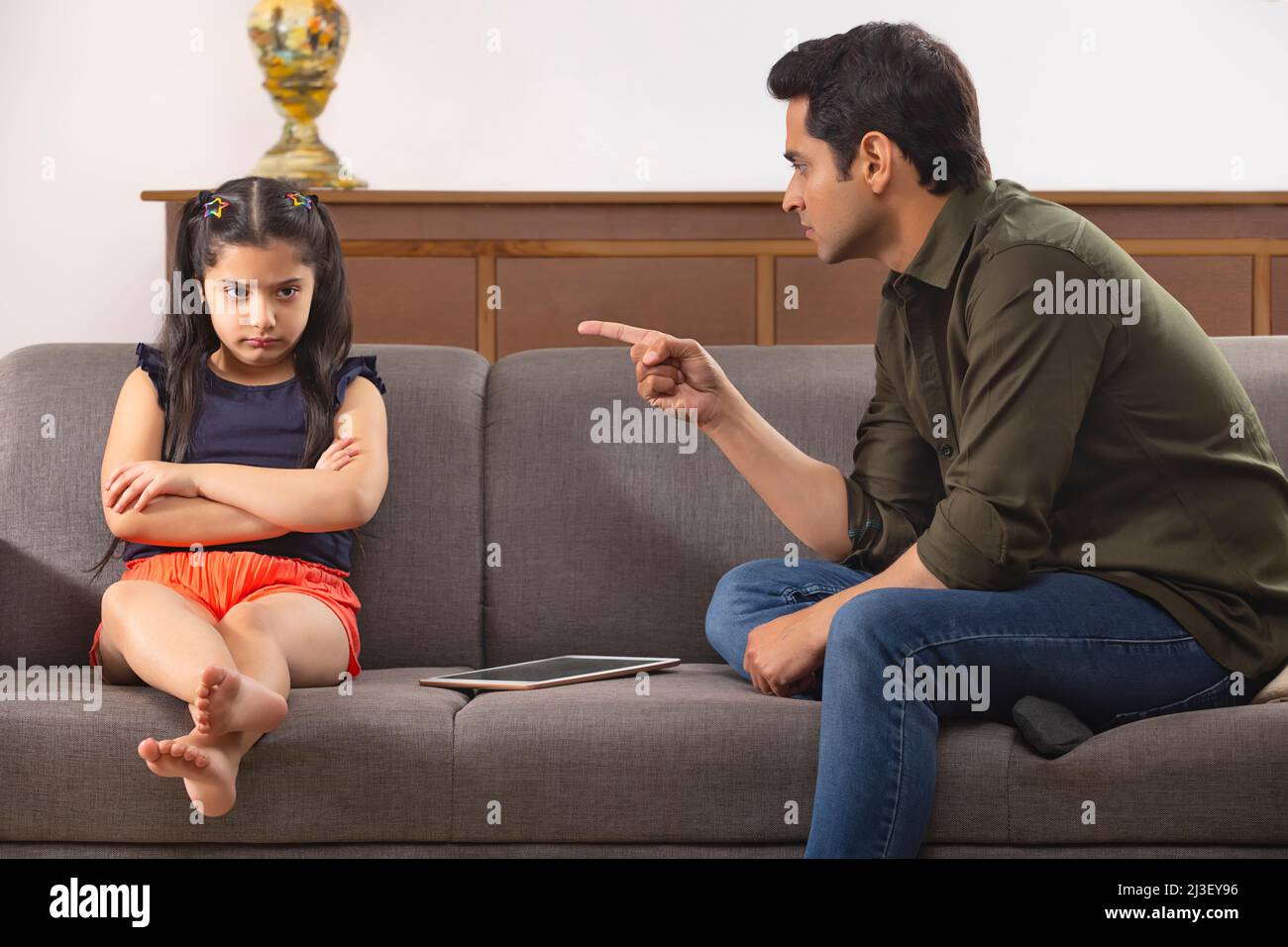 Father scolding his daughter by showing finger at home Stock Photo - Alamy