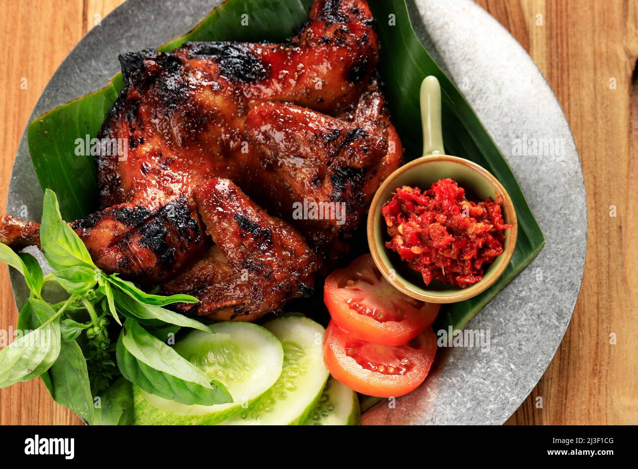 Top View Ayam Bakar Manis, Sweet Roasted Chicken with Honey, Herbs, and ...