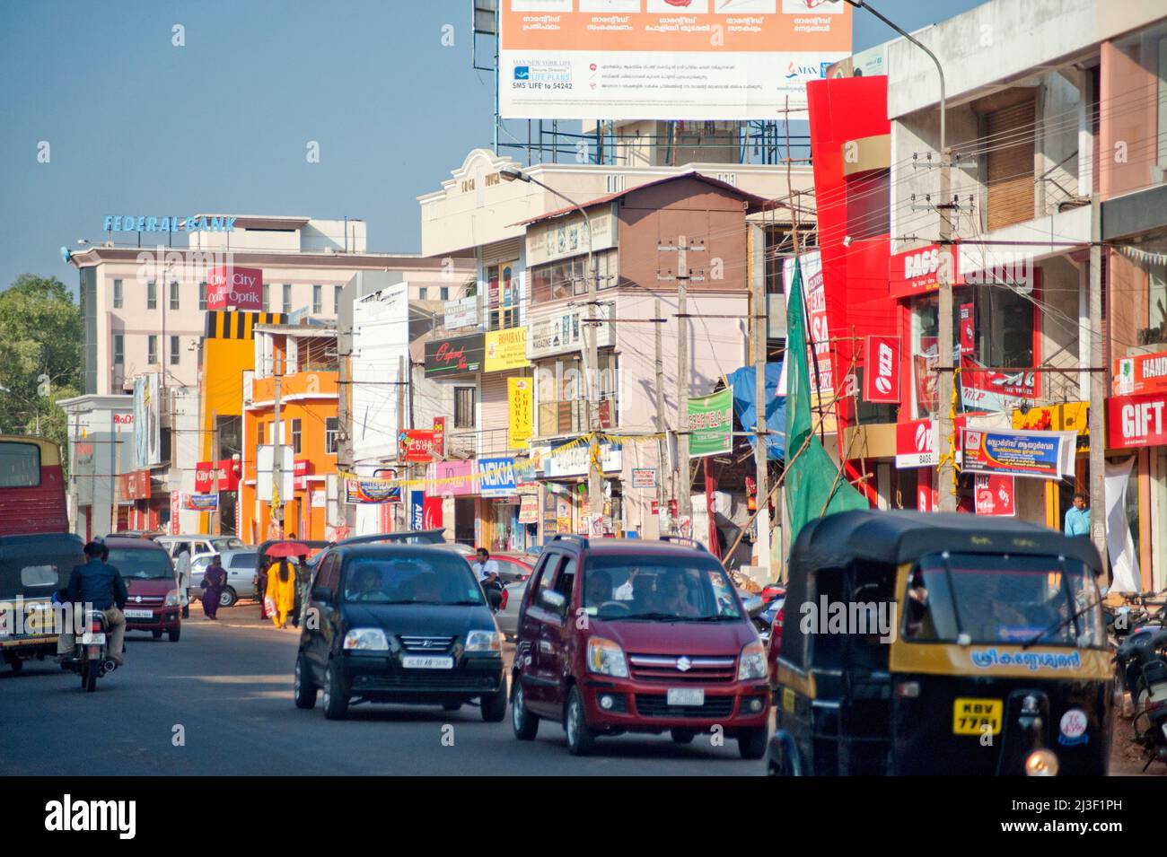 Buildings and traffic at M G Road Trivandrum Thiruvananthapuram state ...