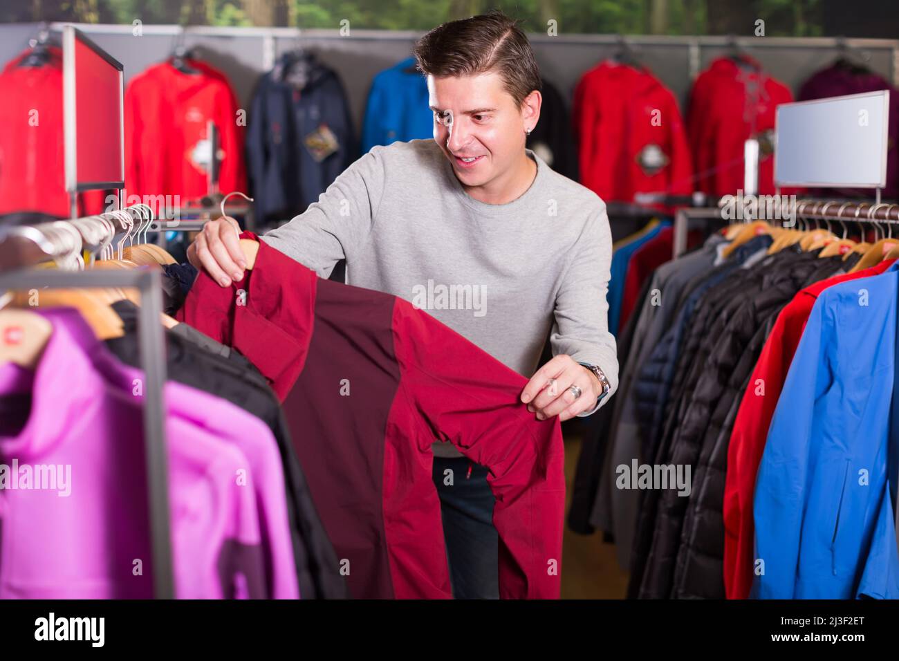 professional athlete chooses sporty clothes and comfortable shoes in ...