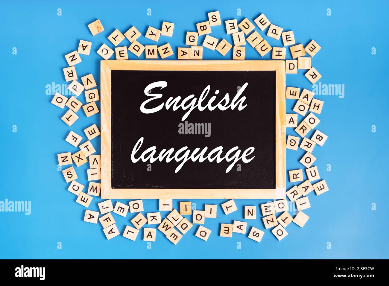 Chalk board with latin letters on blue background Stock Photo - Alamy