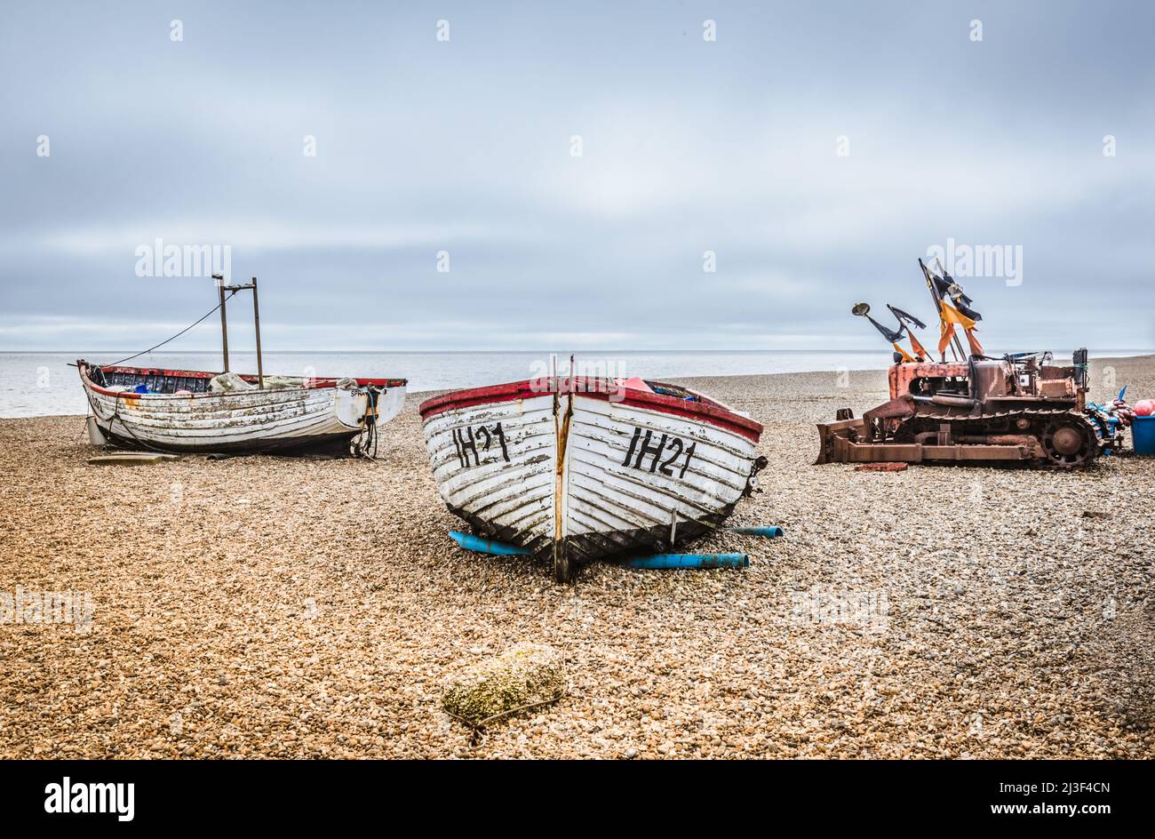 Old fishing boats on the beach Stock Photo - Alamy
