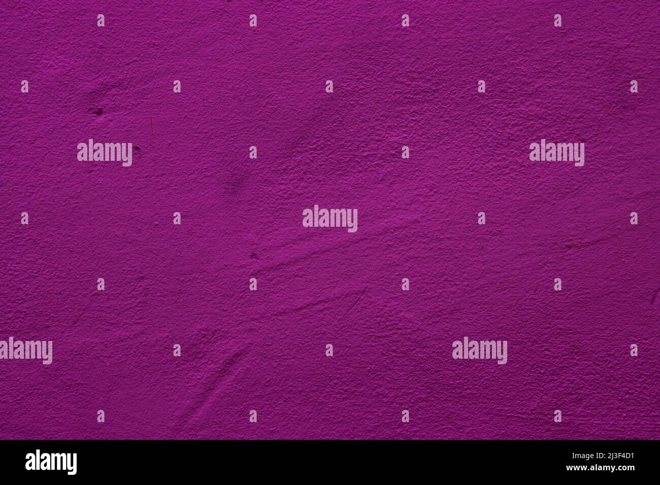 Magenta colored wall texture background with textures of different ...