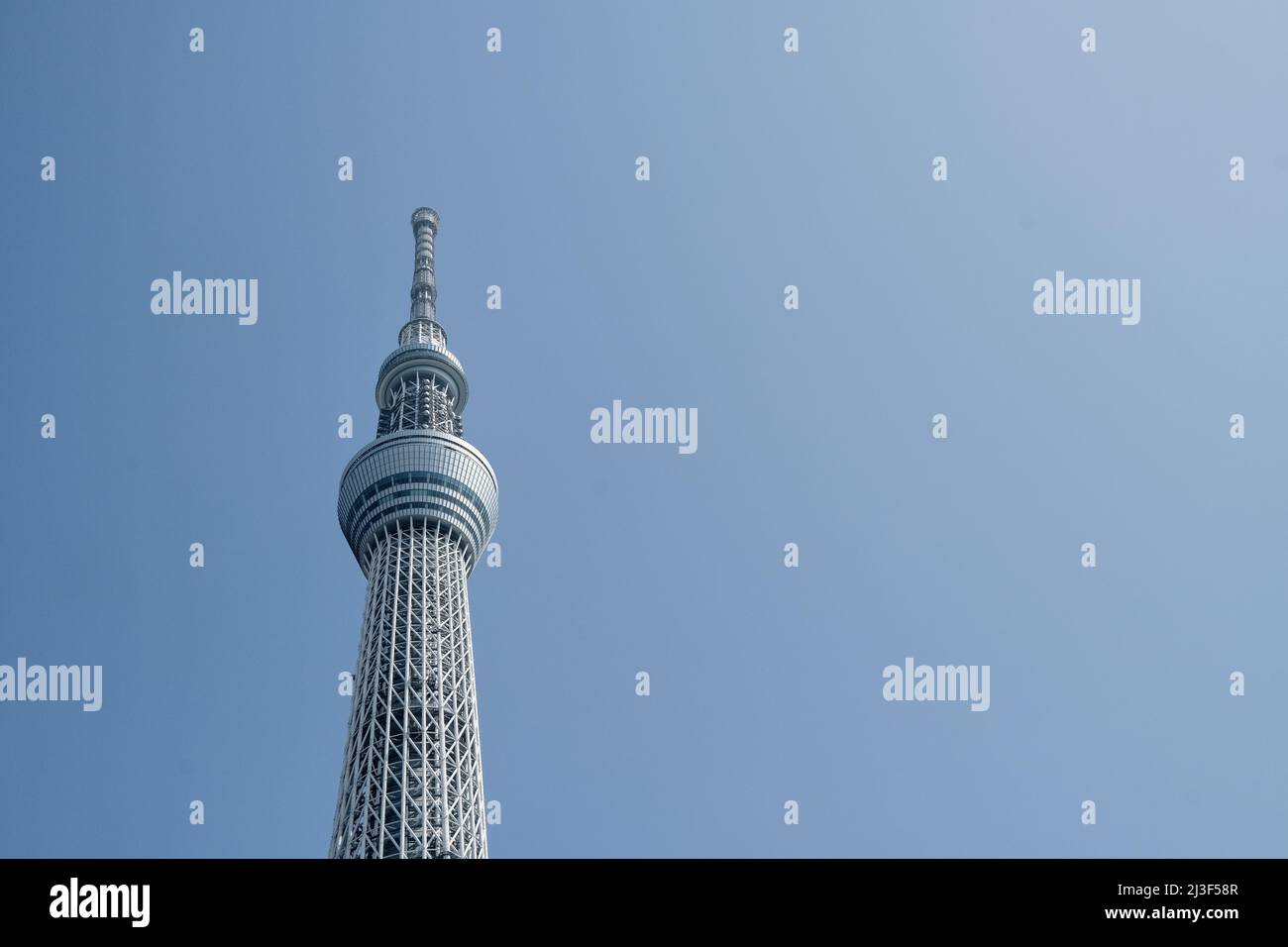 Tokyo Tower against a clear sky in Tokyo, Japan Stock Photo - Alamy