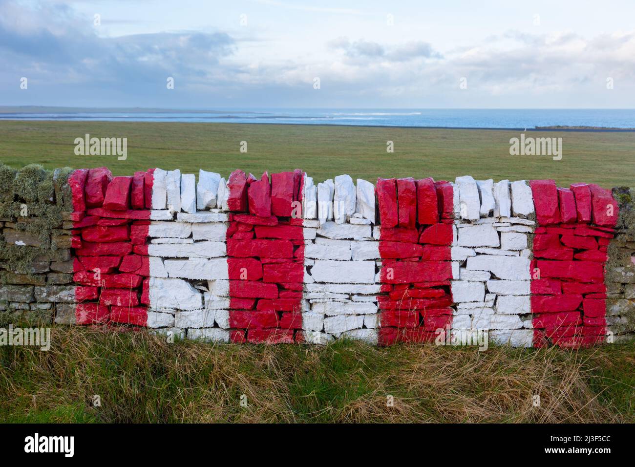 Airfield markings on a stone wall, Papa Westray, Orkney Islands, UK ...