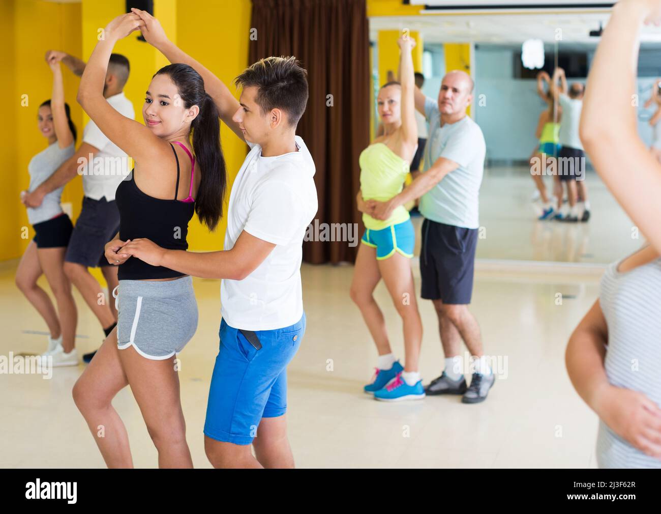 People dancing salsa in studio Stock Photo - Alamy