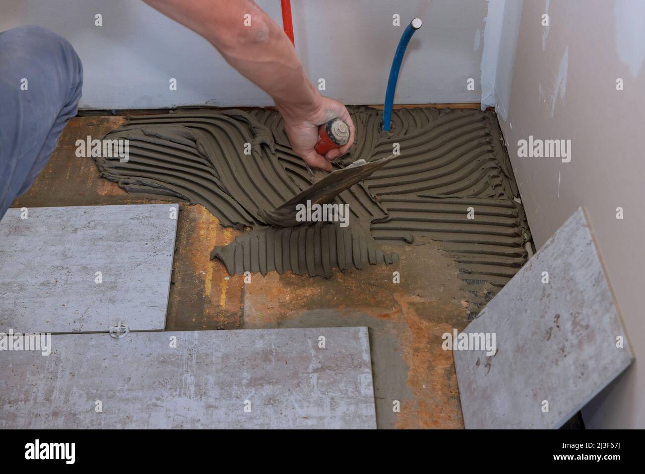 Workers using a trowel hi-res stock photography and images - Alamy