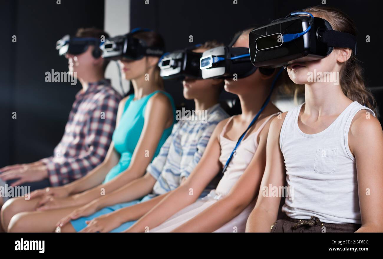 Happy family is watching VR Stock Photo - Alamy