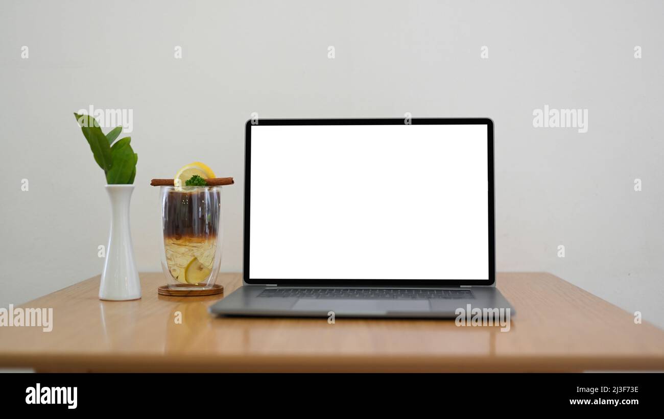 Remote working in a coffee shop concept. Open notebook laptop computer ...