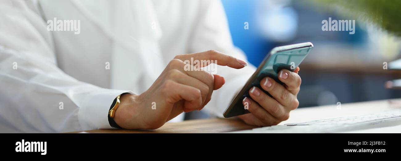 Female hold modern device in hand Stock Photo - Alamy