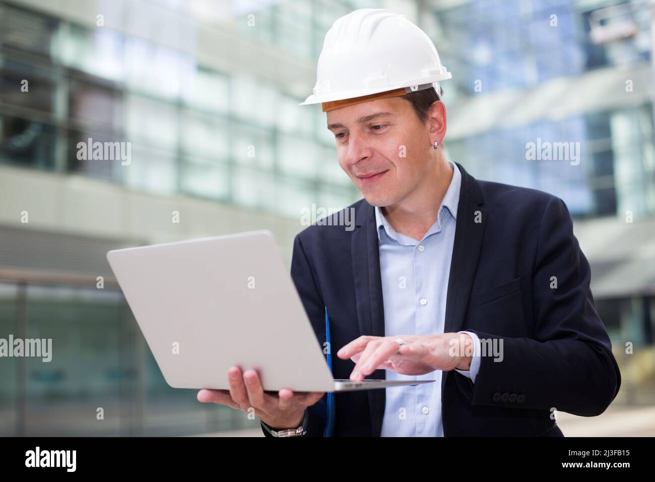 Portrait smiling engineer laptop hi-res stock photography and images ...