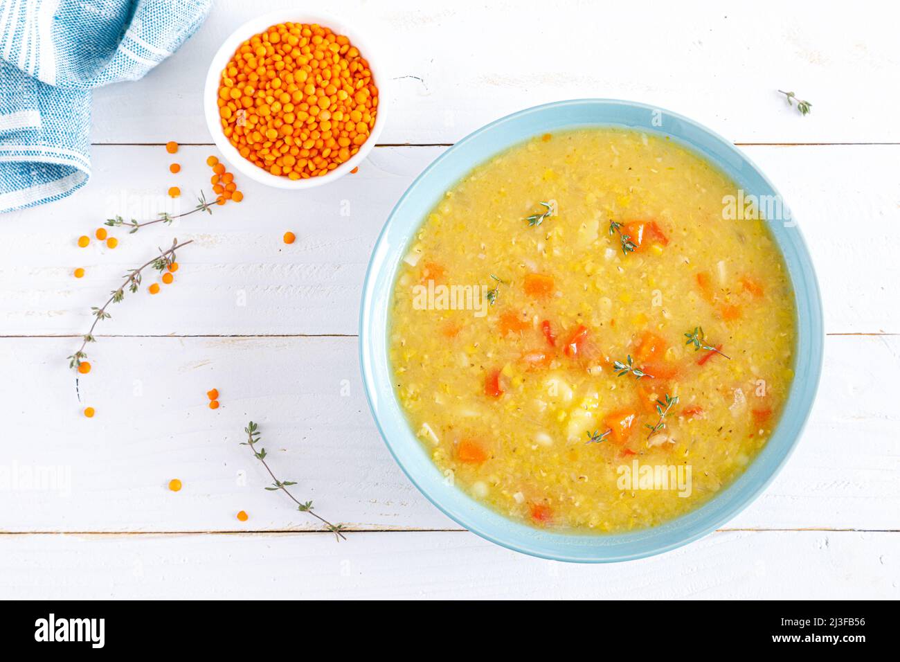Corba. Vegan turkish red lentil thyme soup. Top view Stock Photo - Alamy