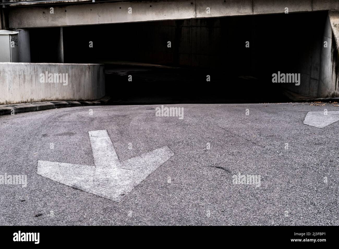 traffic sign with an arrow in a street Stock Photo - Alamy