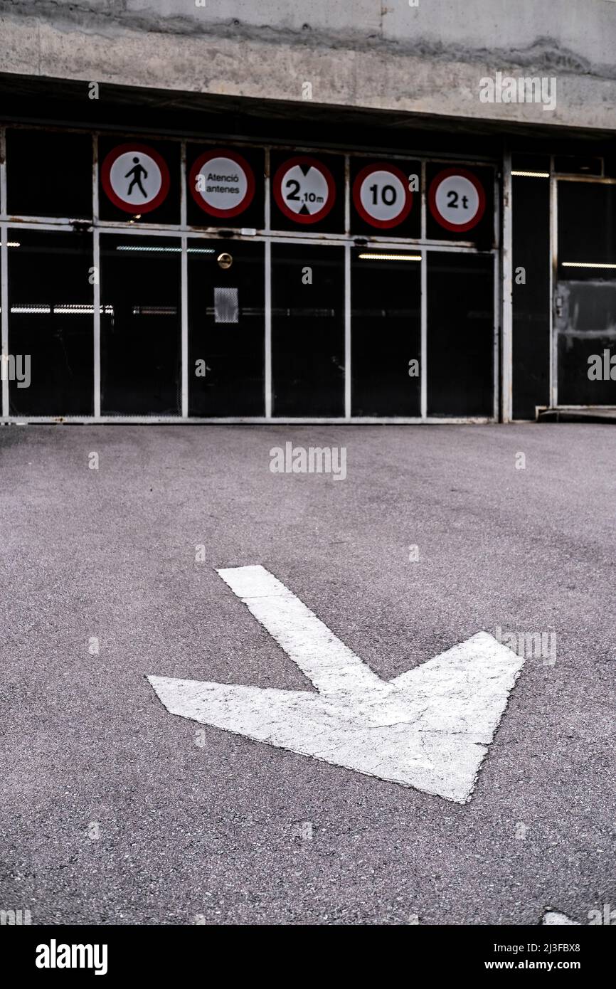 traffic sign with an arrow in a street Stock Photo - Alamy