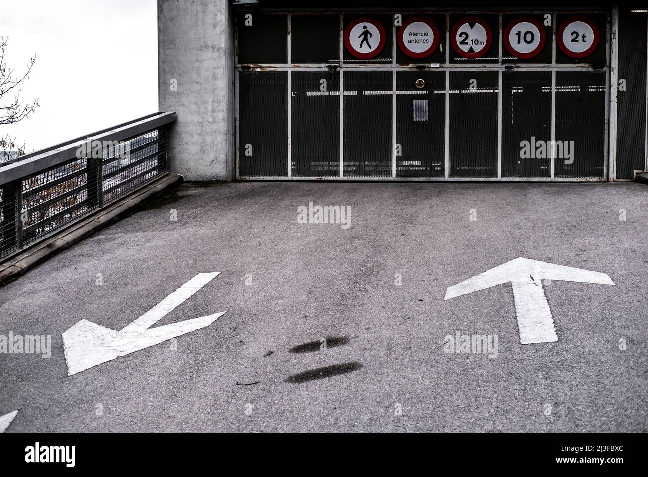 traffic sign with an arrow in a street Stock Photo - Alamy