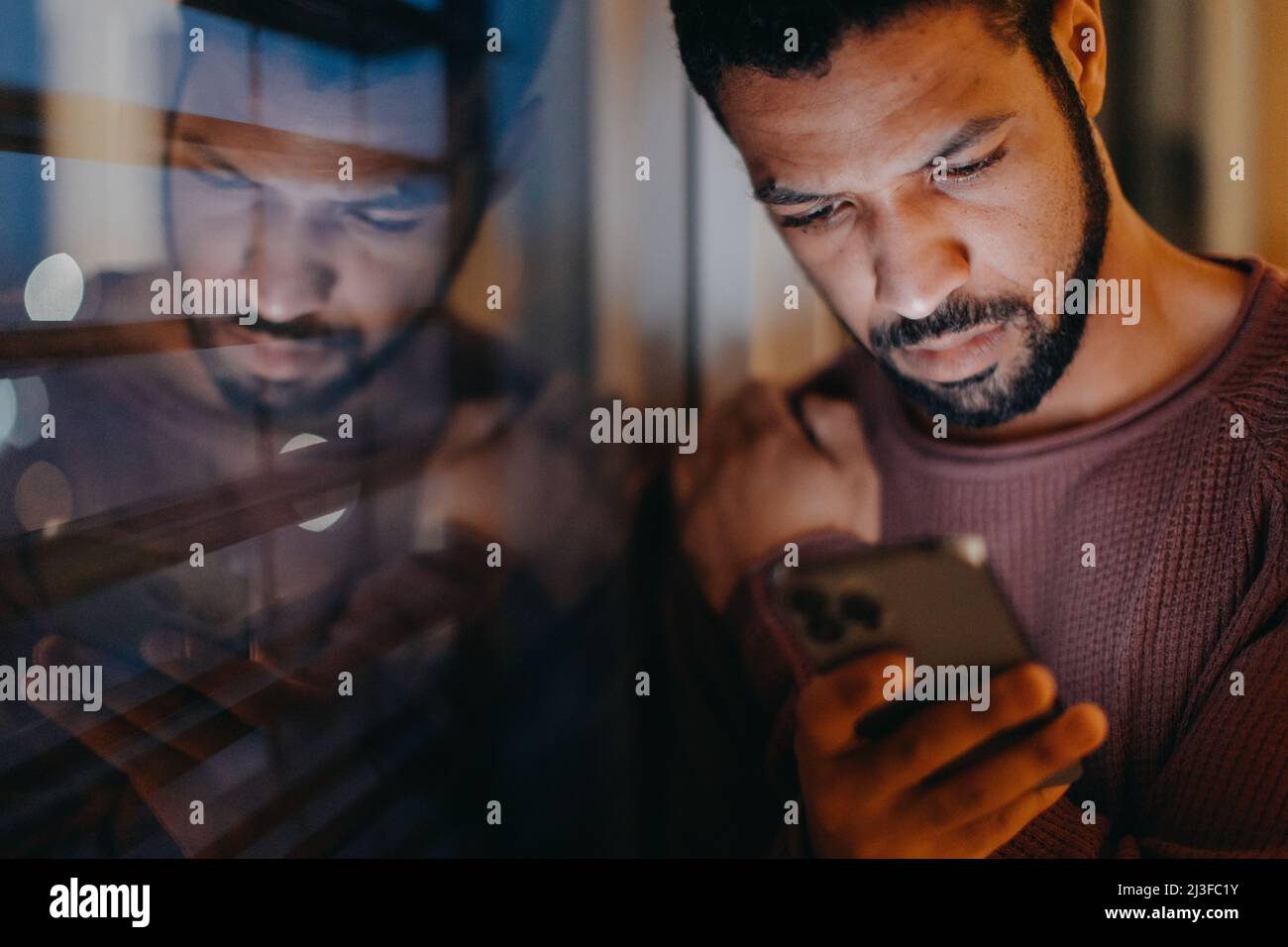 Sad man window hi-res stock photography and images - Alamy