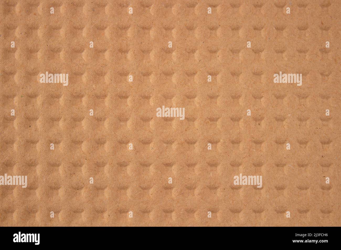Embossed brown kraft paper as background with copy space. Sustainable ...