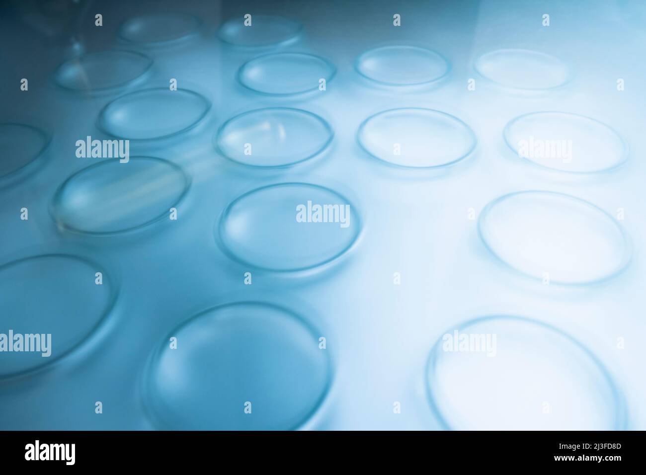 Blue backdrop abstract round shapes, selective focus around shapes ...