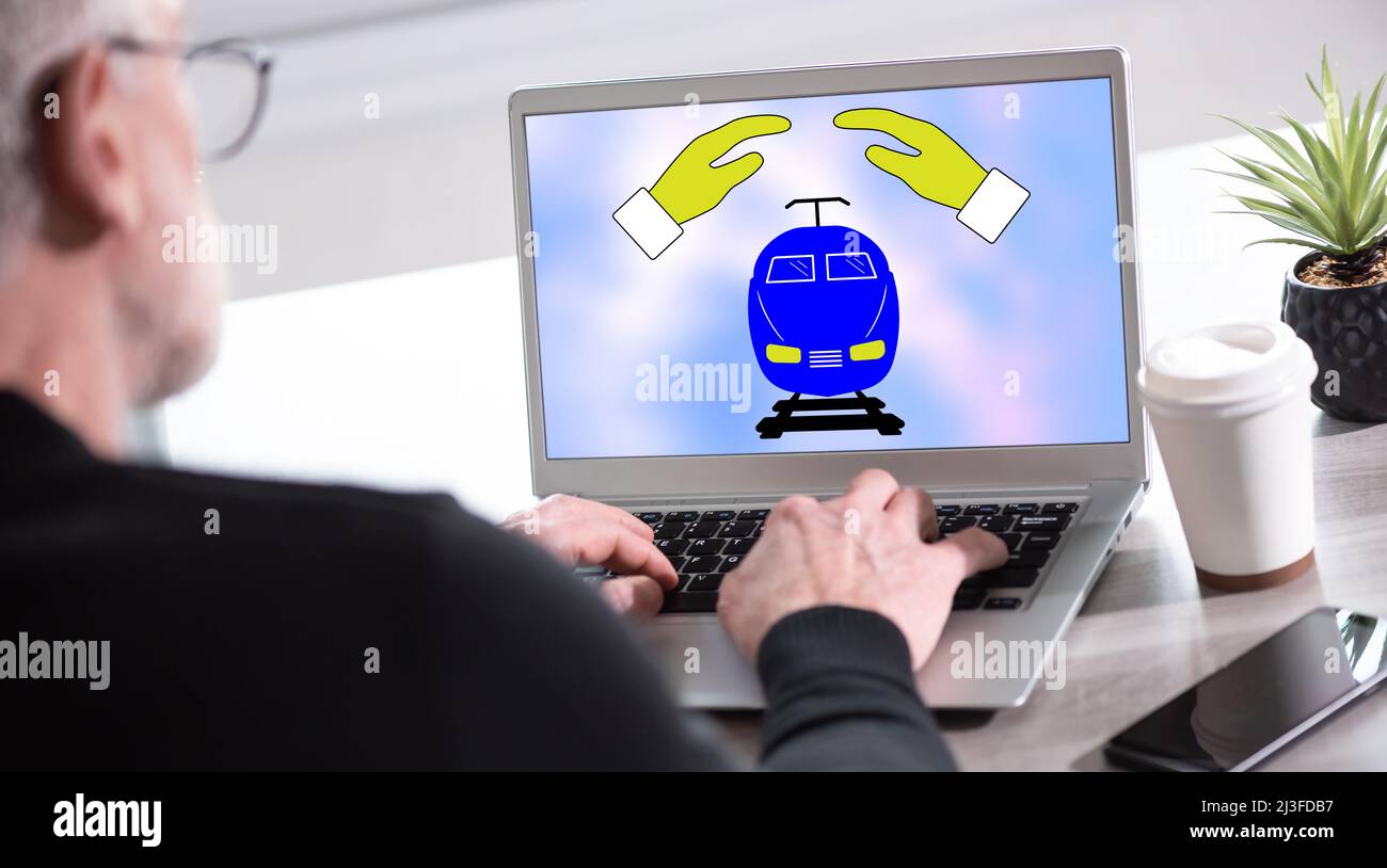 Laptop screen displaying a train insurance concept Stock Photo - Alamy