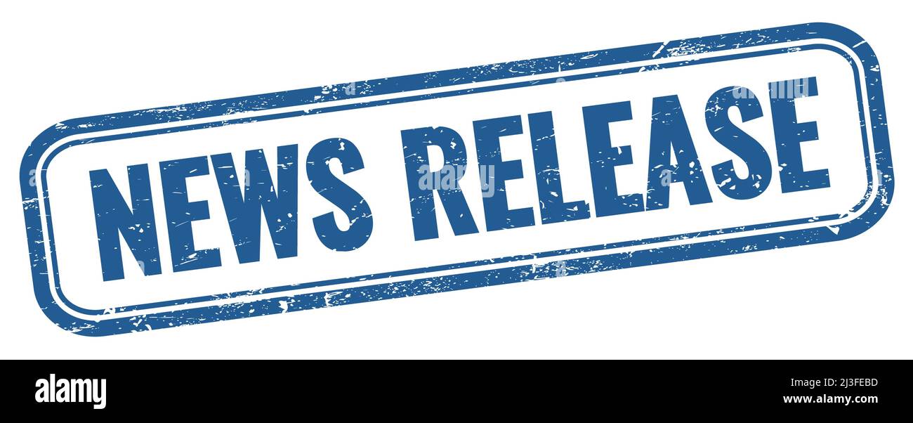 NEWS RELEASE, words written on blue stamp sign Stock Photo - Alamy
