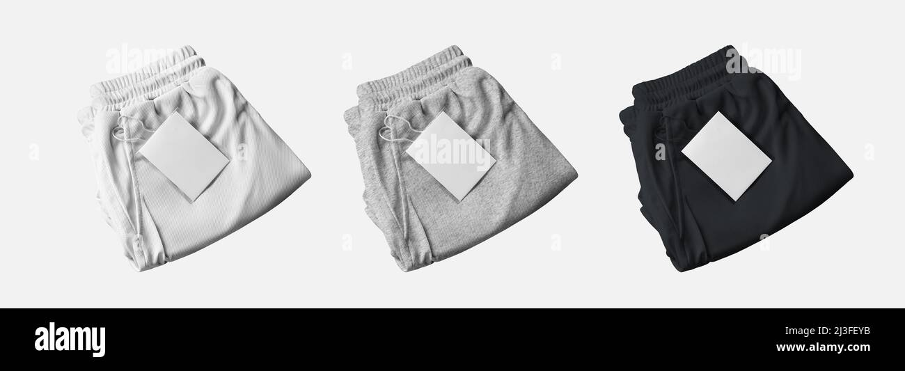 Mockups of sports folded men's shorts with compression shorts label ...