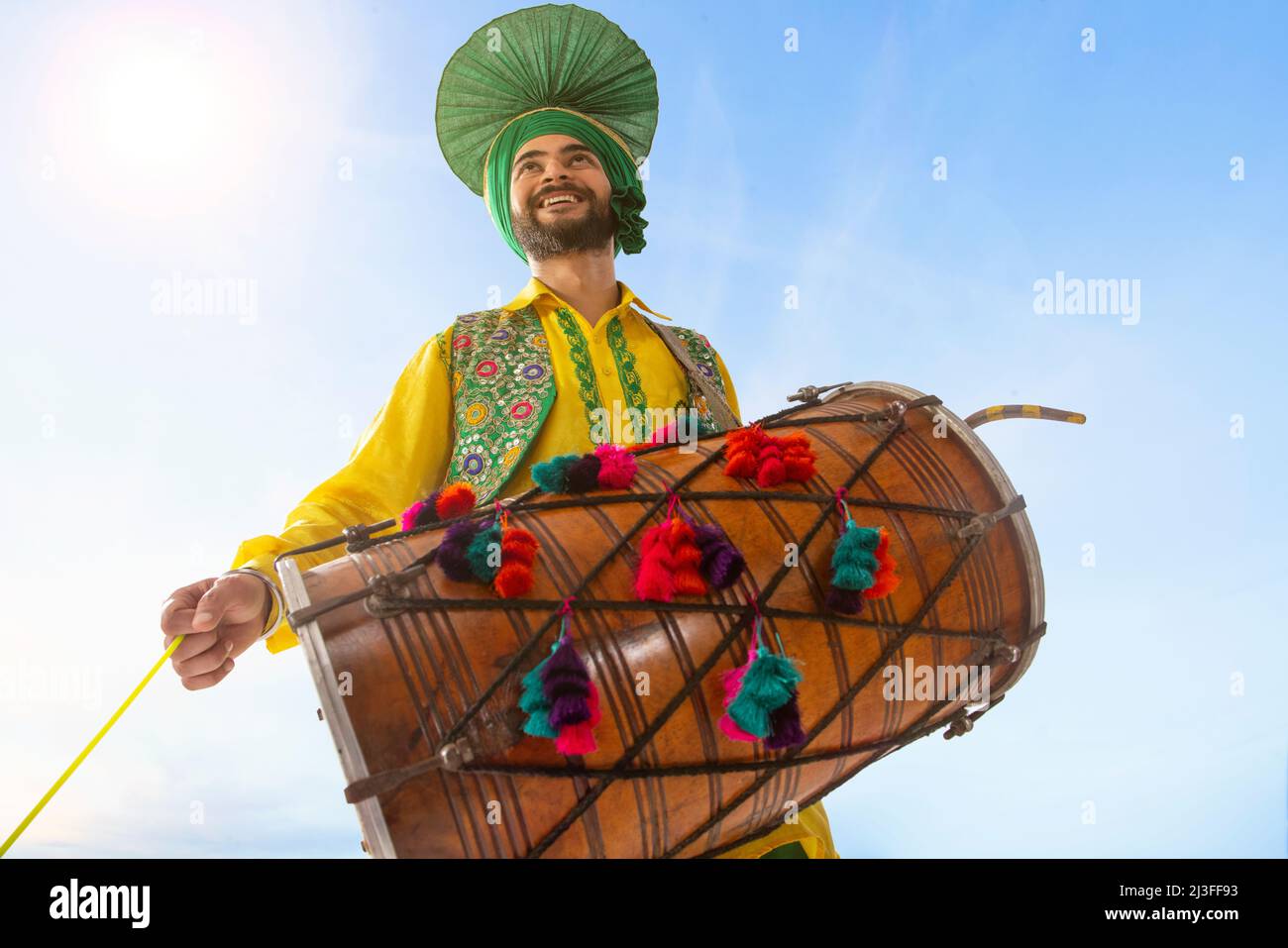 Portrait of Sikh man playing drum during Baisakhi celebration Stock ...