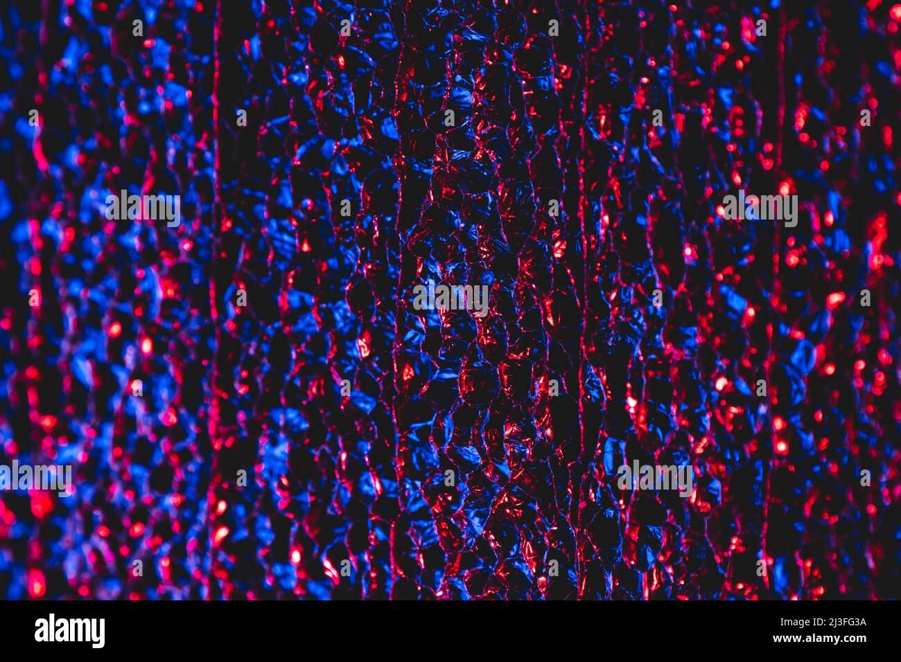 Blue red textured packing material Stock Photo - Alamy