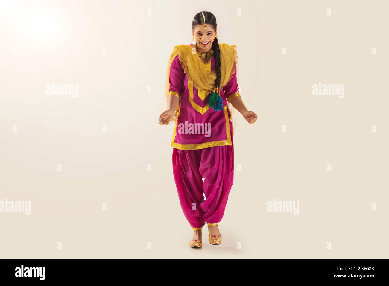 Sikh Woman performing bhangra during Baisakhi Celebration Stock Photo ...