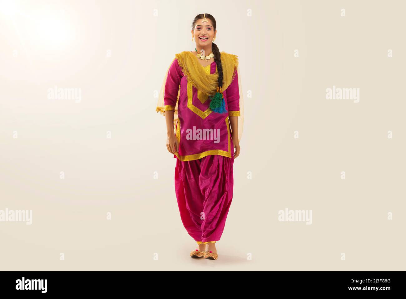 Sikh Woman performing bhangra during Baisakhi Celebration Stock Photo ...