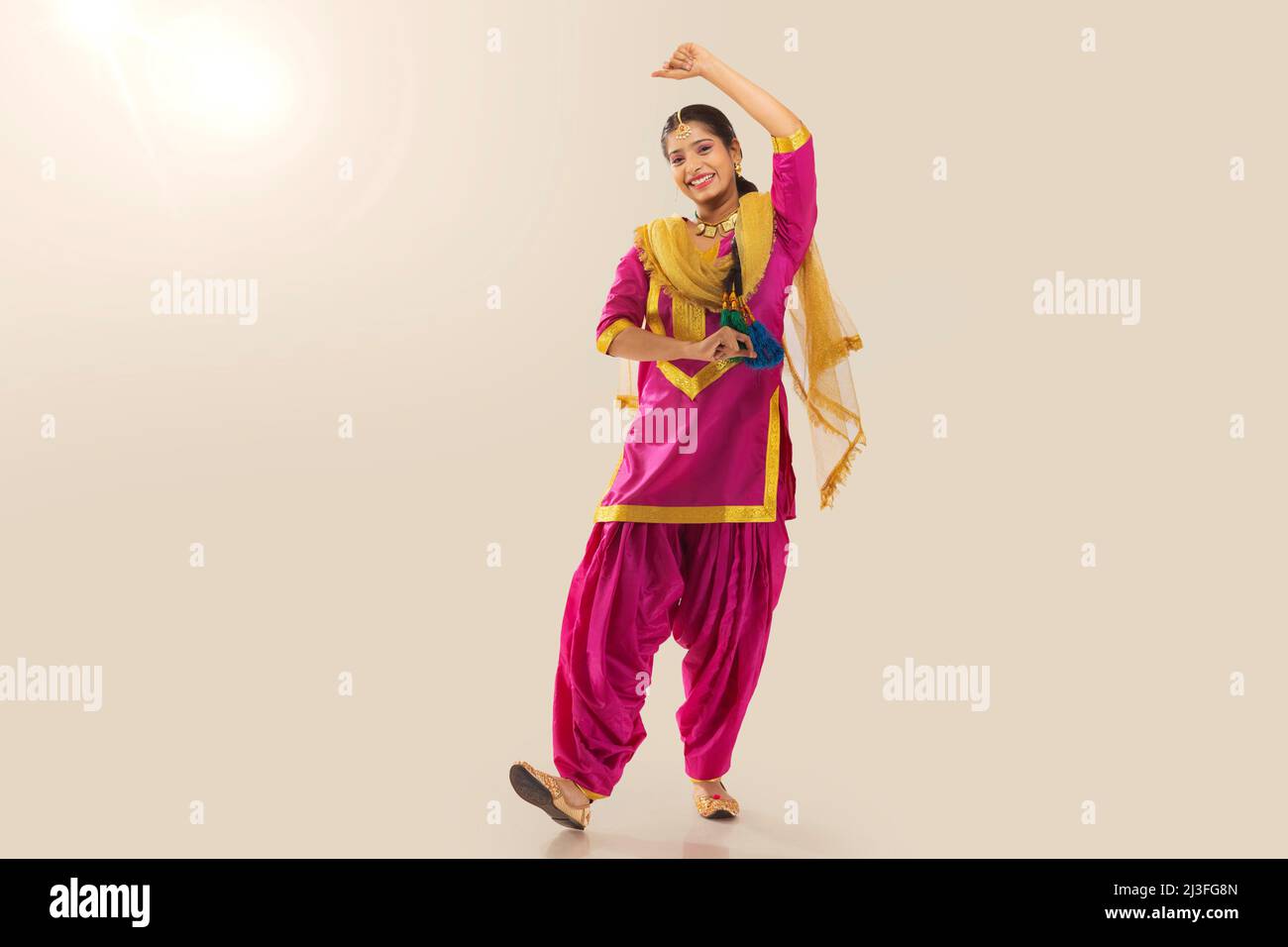Sikh Woman performing bhangra during Baisakhi Celebration Stock Photo ...