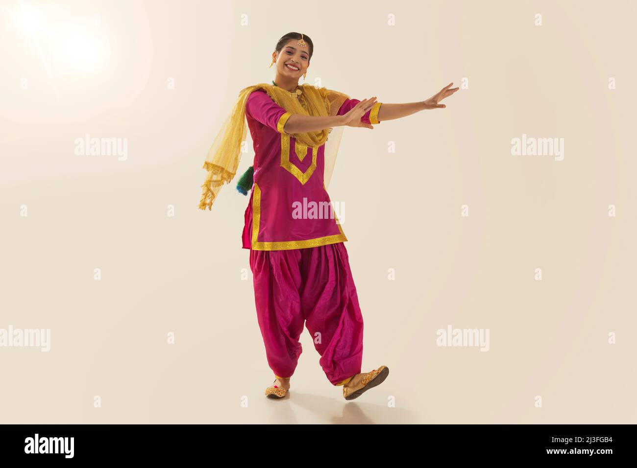 Sikh Woman performing bhangra during Baisakhi Celebration Stock Photo ...